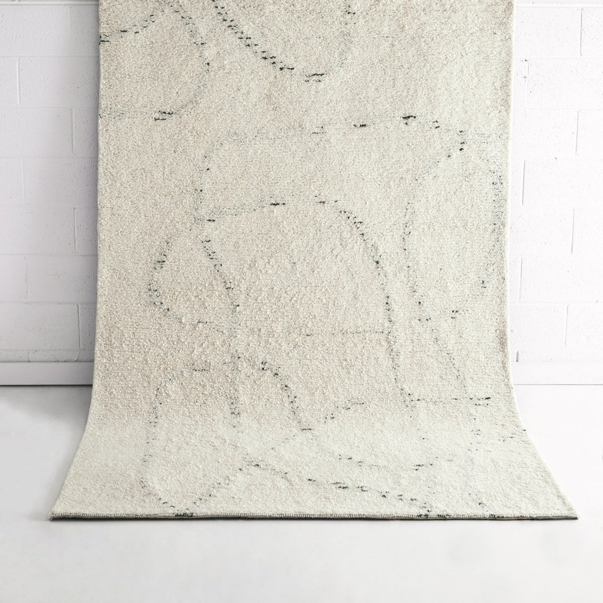 Kiah Ivory Wool Rug by DecoRug: Luxurious and Durable Statement Piece